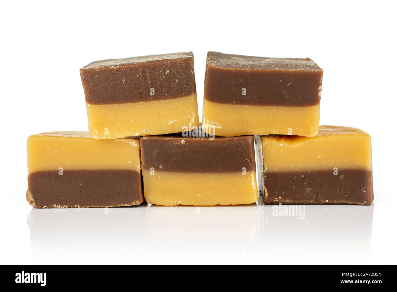 Group of five whole sweet brown caramel chocolate candy isolated on ...