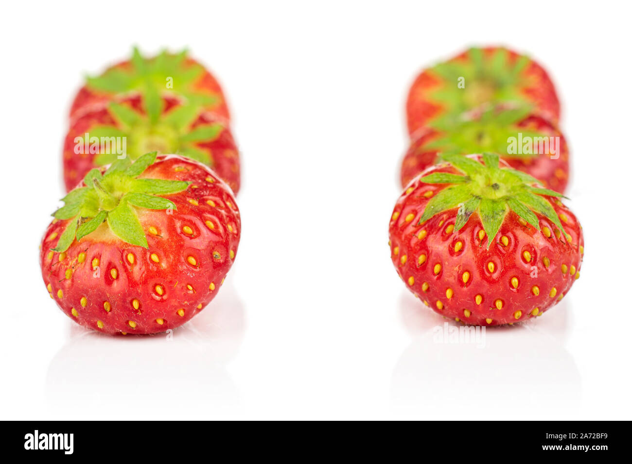 Group of six whole fresh red strawberry isolated on white background ...