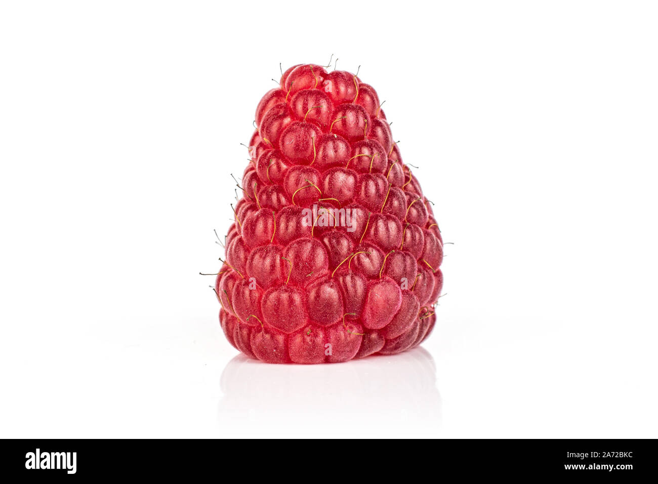 One whole fresh red raspberry isolated on white background Stock Photo ...