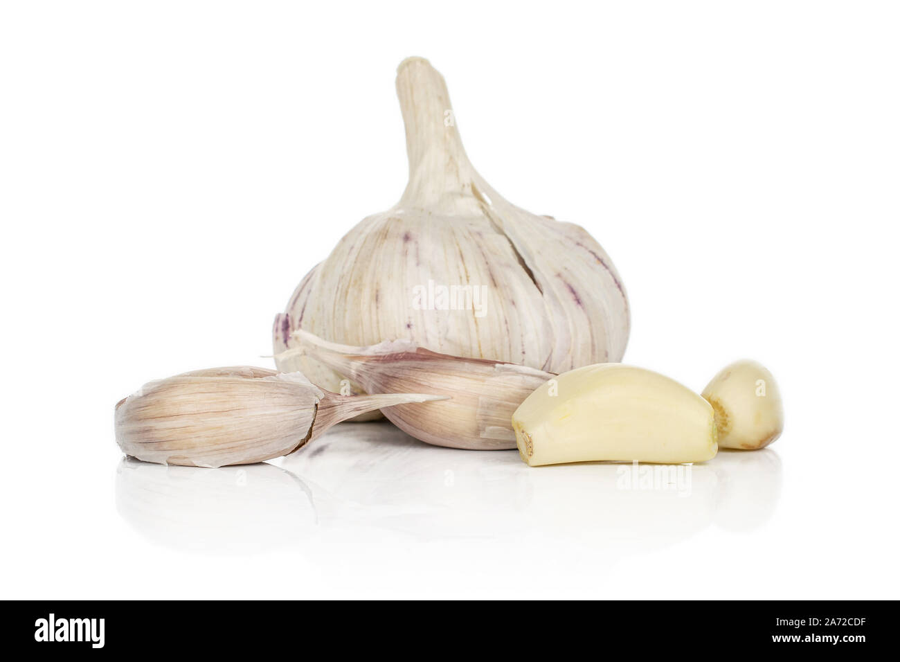 Group of one whole four pieces of aromatic white garlic isolated on ...