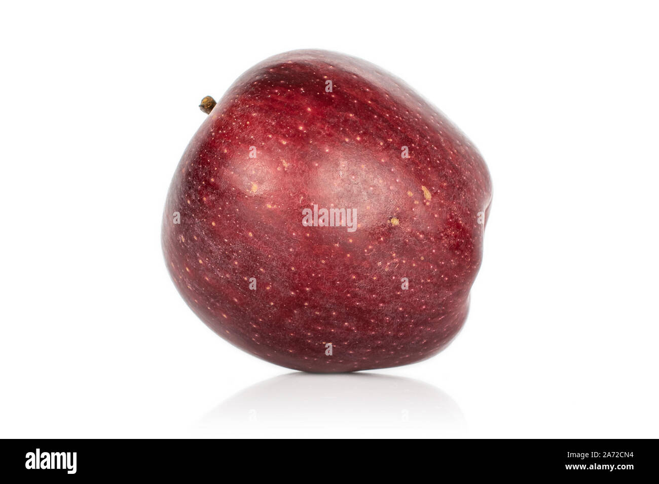 One whole fresh apple red delicious isolated on white background Stock ...