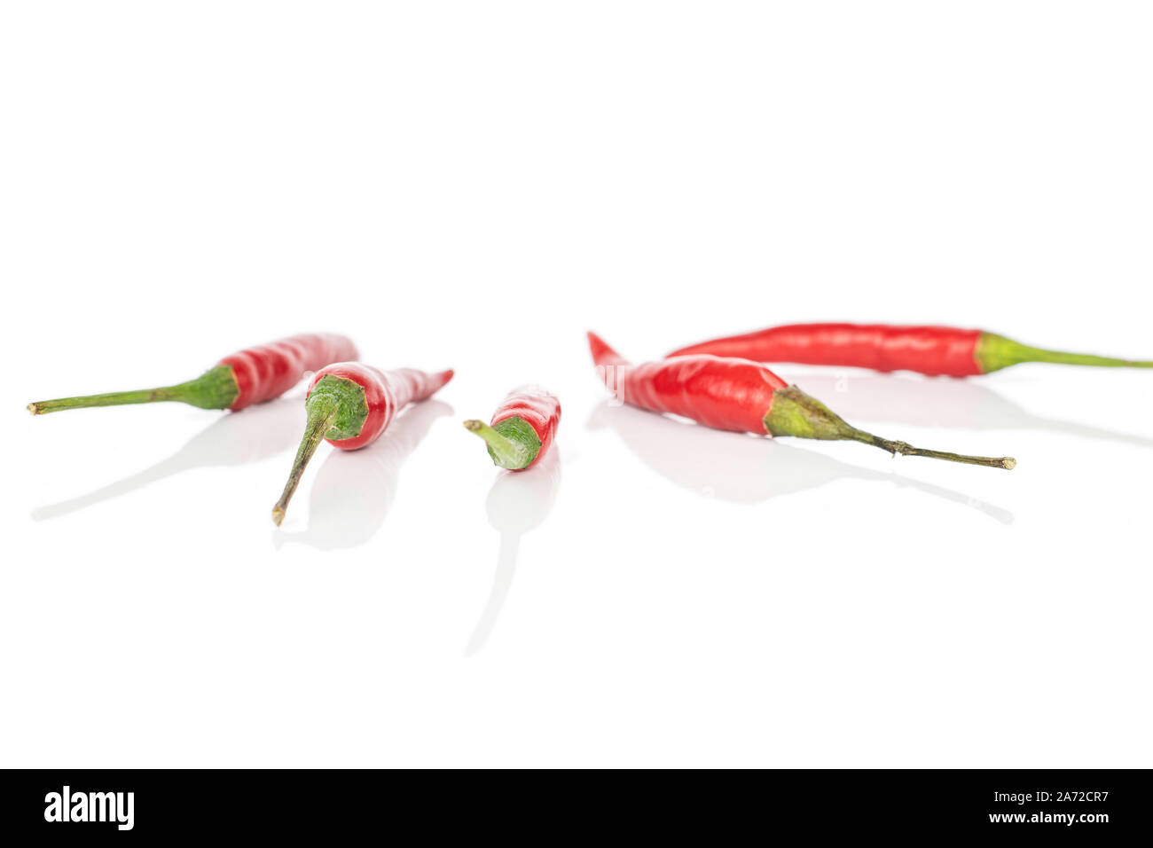 Group of five whole hot red chili isolated on white background Stock ...