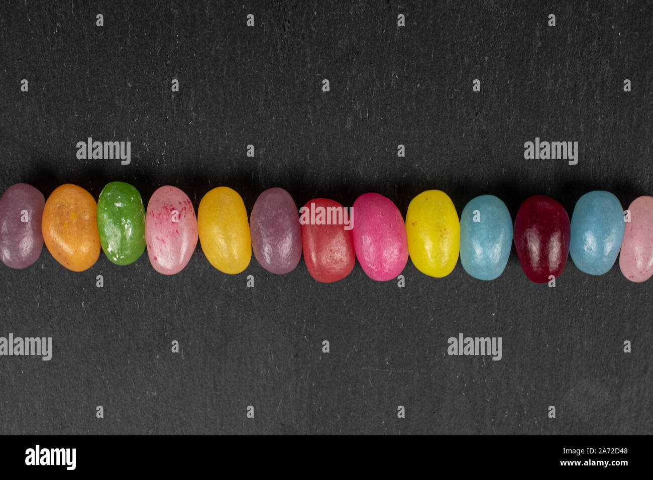 Single Red Jelly Bean Sweet High Resolution Stock Photography and ...