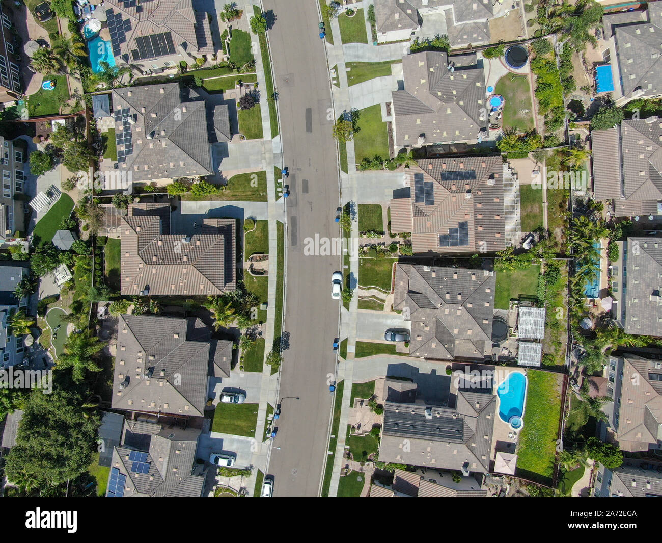 Aerial top view suburban neighborhood with big villas next to each ...
