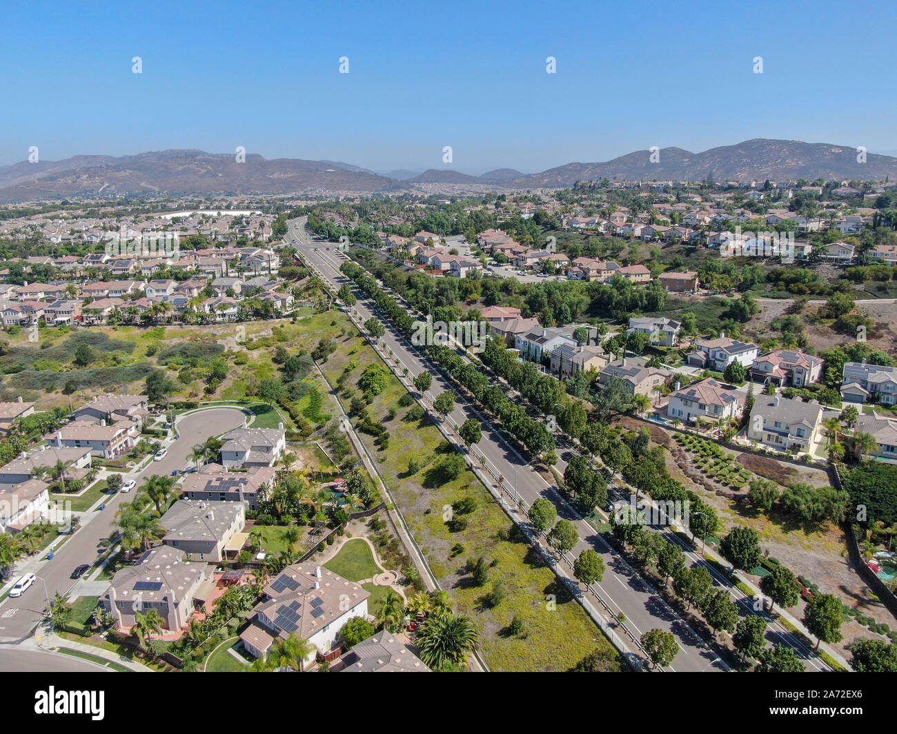 Aerial view suburban neighborhood with big villas next to each other in ...