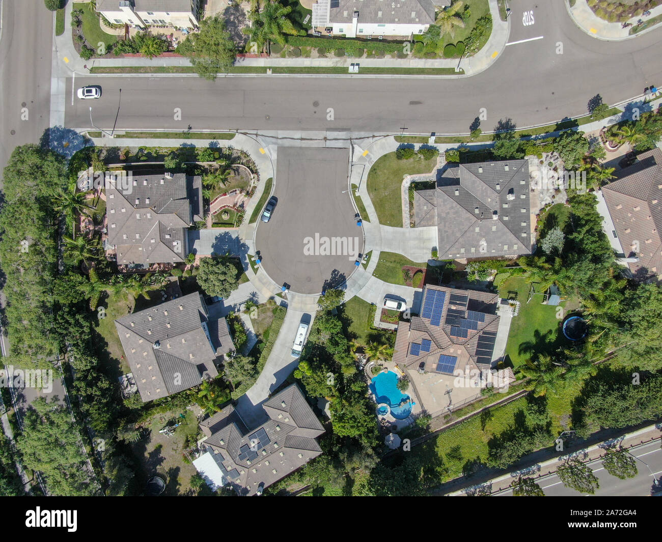 Aerial top view suburban neighborhood with big villas next to each ...