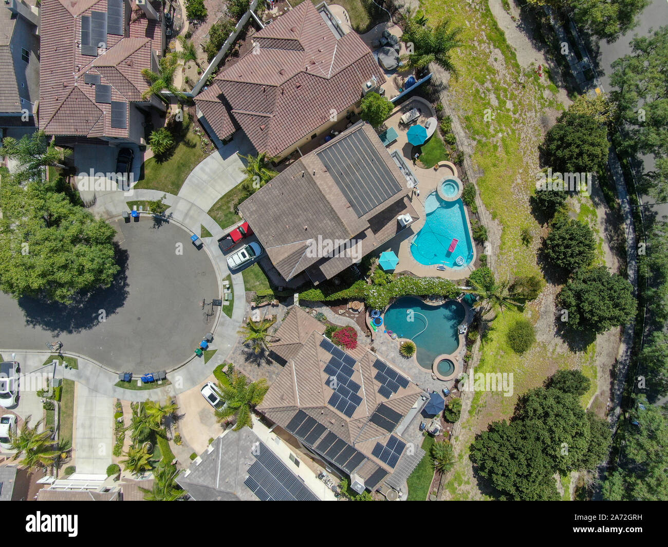 Aerial top view suburban neighborhood with big villas next to each ...