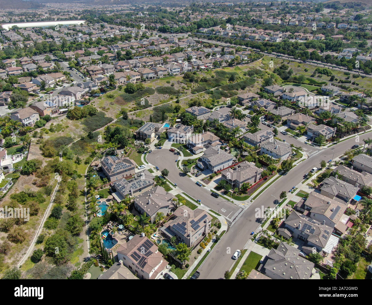 Aerial view suburban neighborhood with big villas next to each other in ...