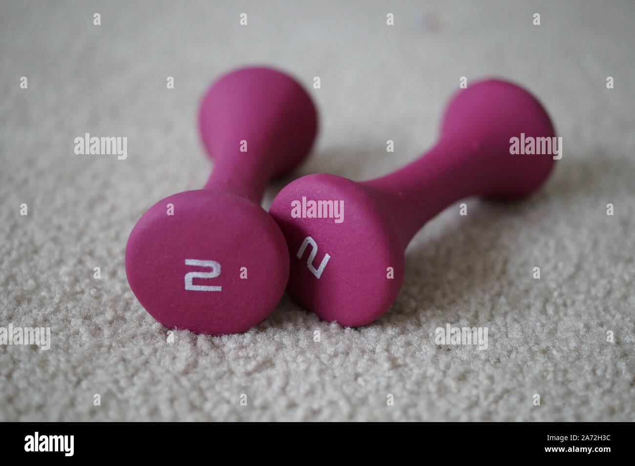 Pink weights hi-res stock photography and images - Alamy