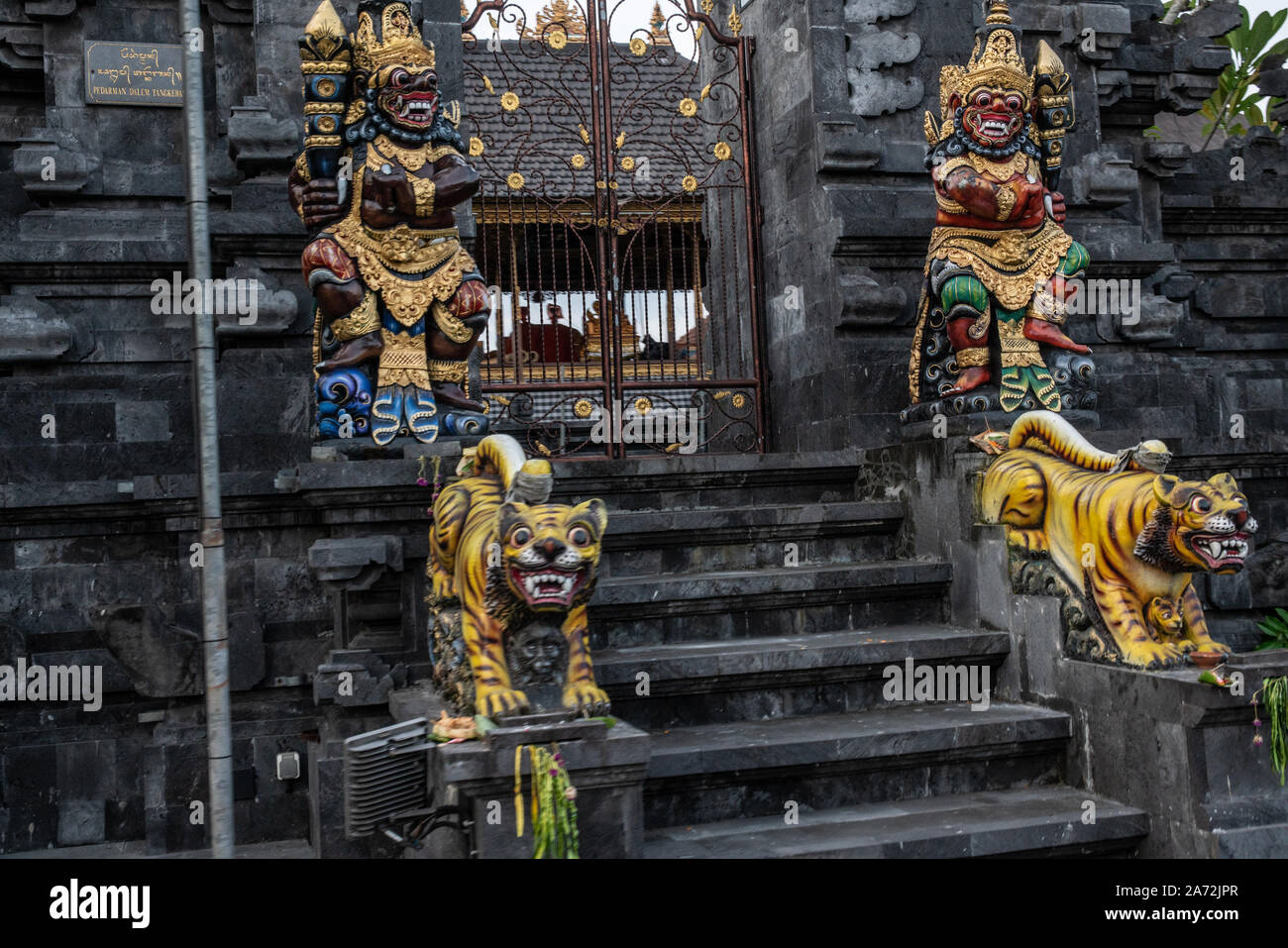 Hindu statues guarding the gates of the temple in Bali Indonesia Stock ...