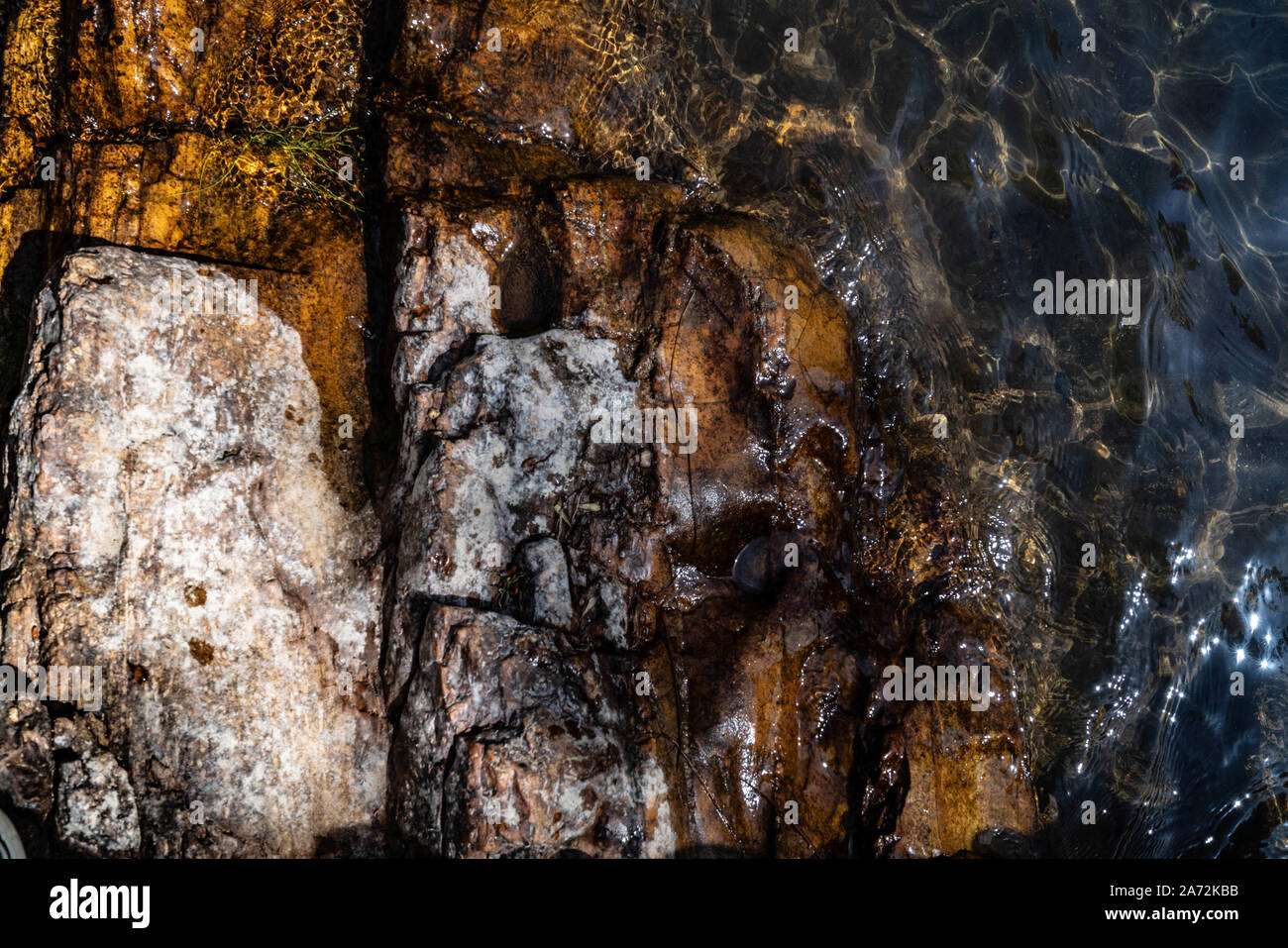 Top down look of Water flowing over uniquely formed rocks leaving ...