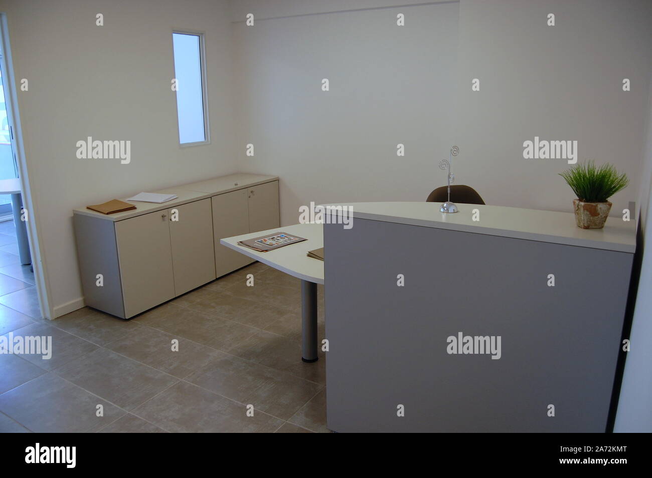 Modern office space reception desk Stock Photo - Alamy