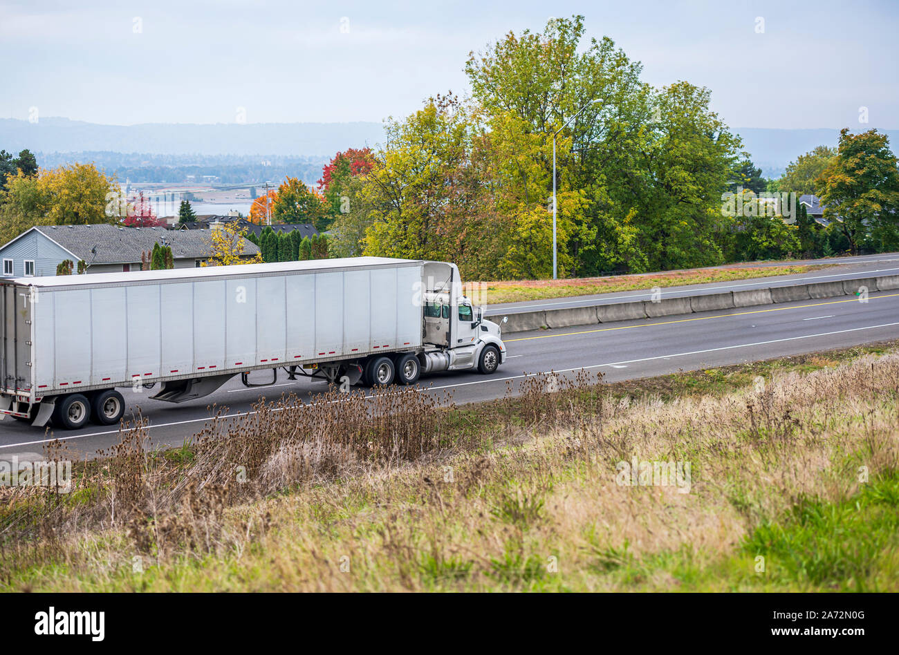 Big rig white day cab with roof spoiler semi truck for local deliveries ...
