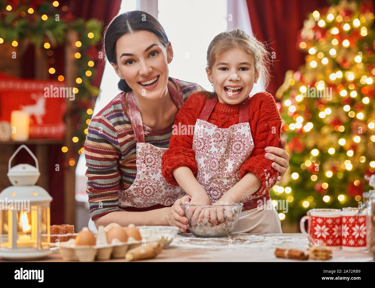 Merry Christmas and Happy Holidays. Family preparation holiday food ...