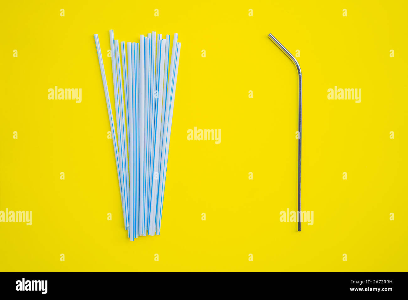 Steel drinking vs disposable straws on a yellow background. Zero waste ...
