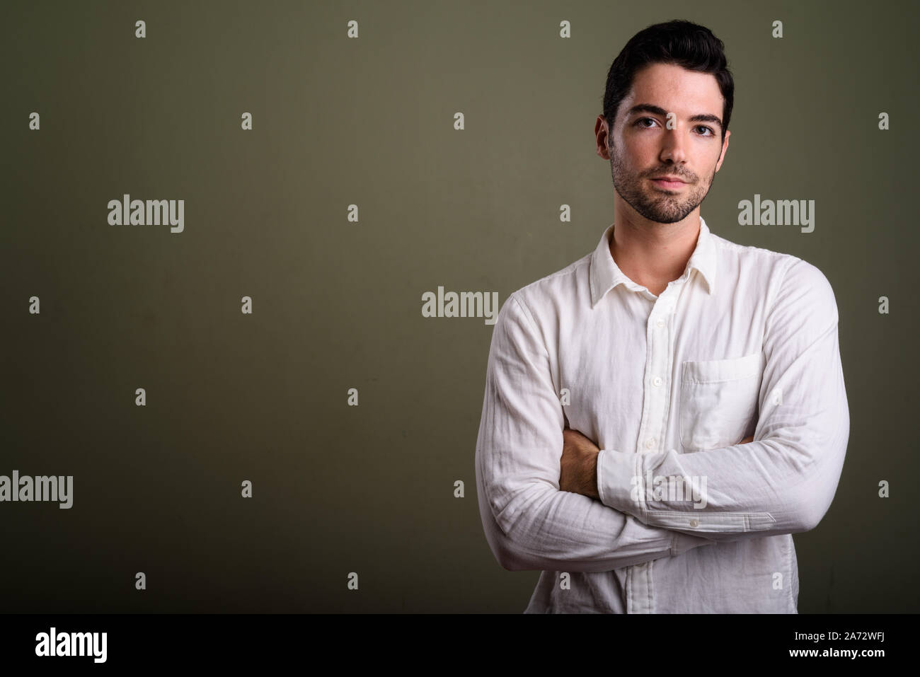 Portrait of young handsome businessman with stubble beard Stock Photo ...