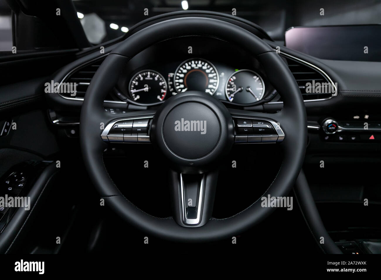 close-up of the dashboard, player, steering wheel, buttons. modern car ...
