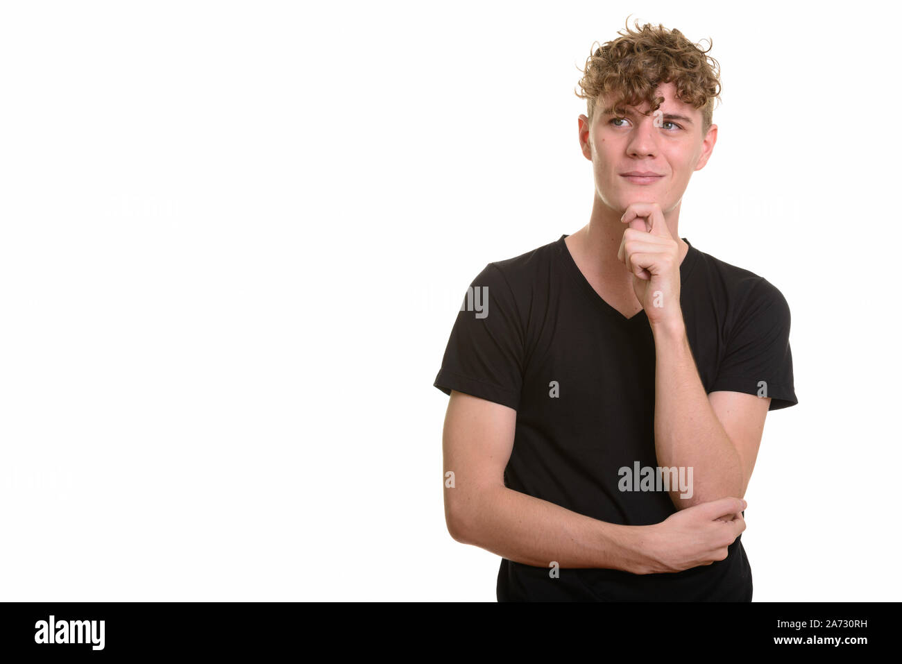 Thoughtful man curly hair Cut Out Stock Images & Pictures - Alamy