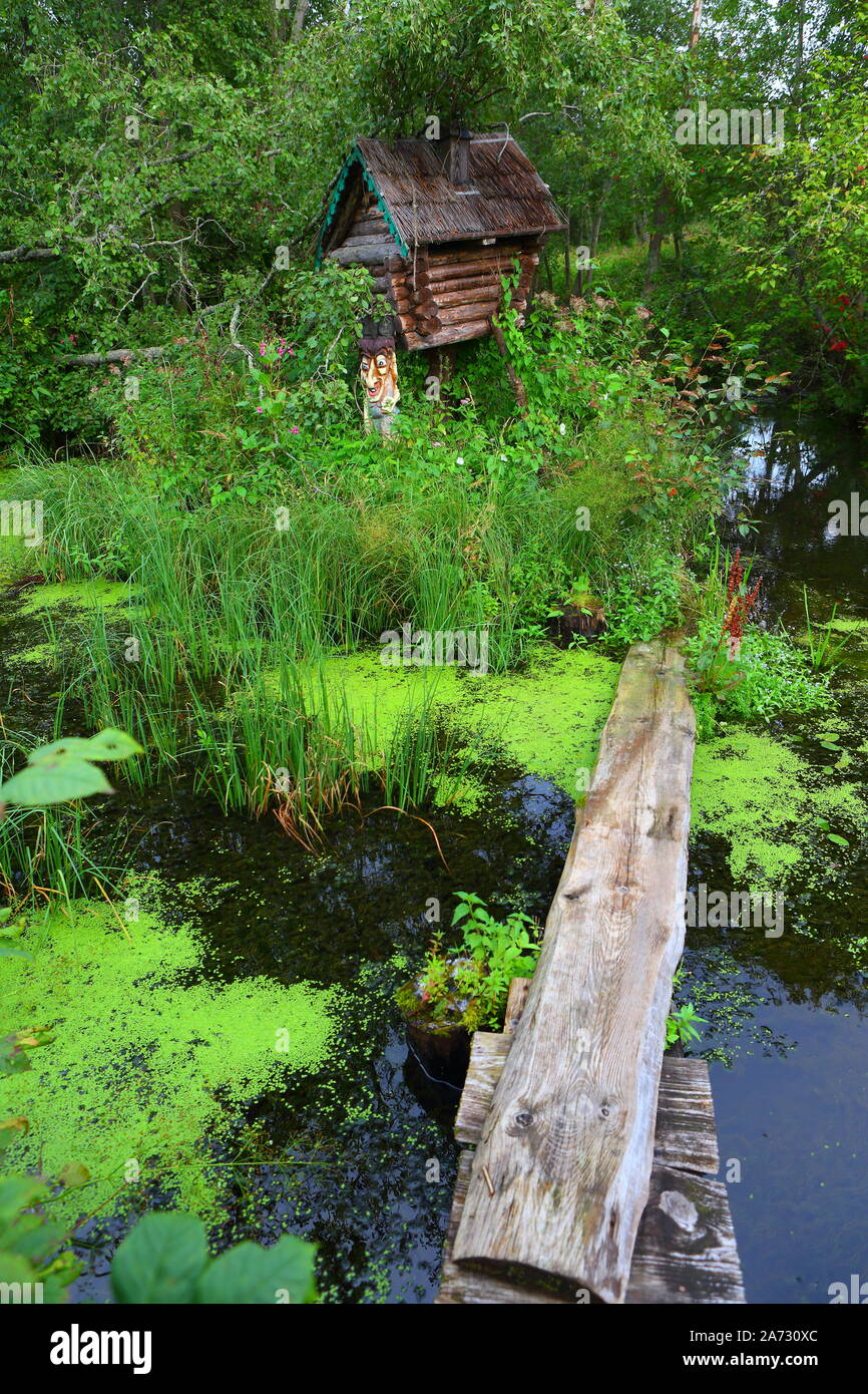 Decorative hut in the forest near the pond Stock Photo - Alamy