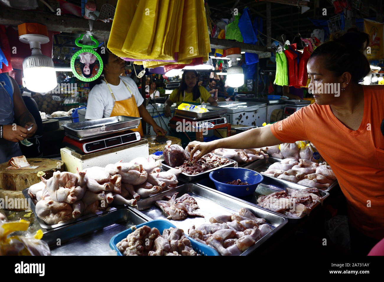 ANTIPOLO CITY, PHILIPPINES – OCTOBER 21, 2019: Customers at a public ...