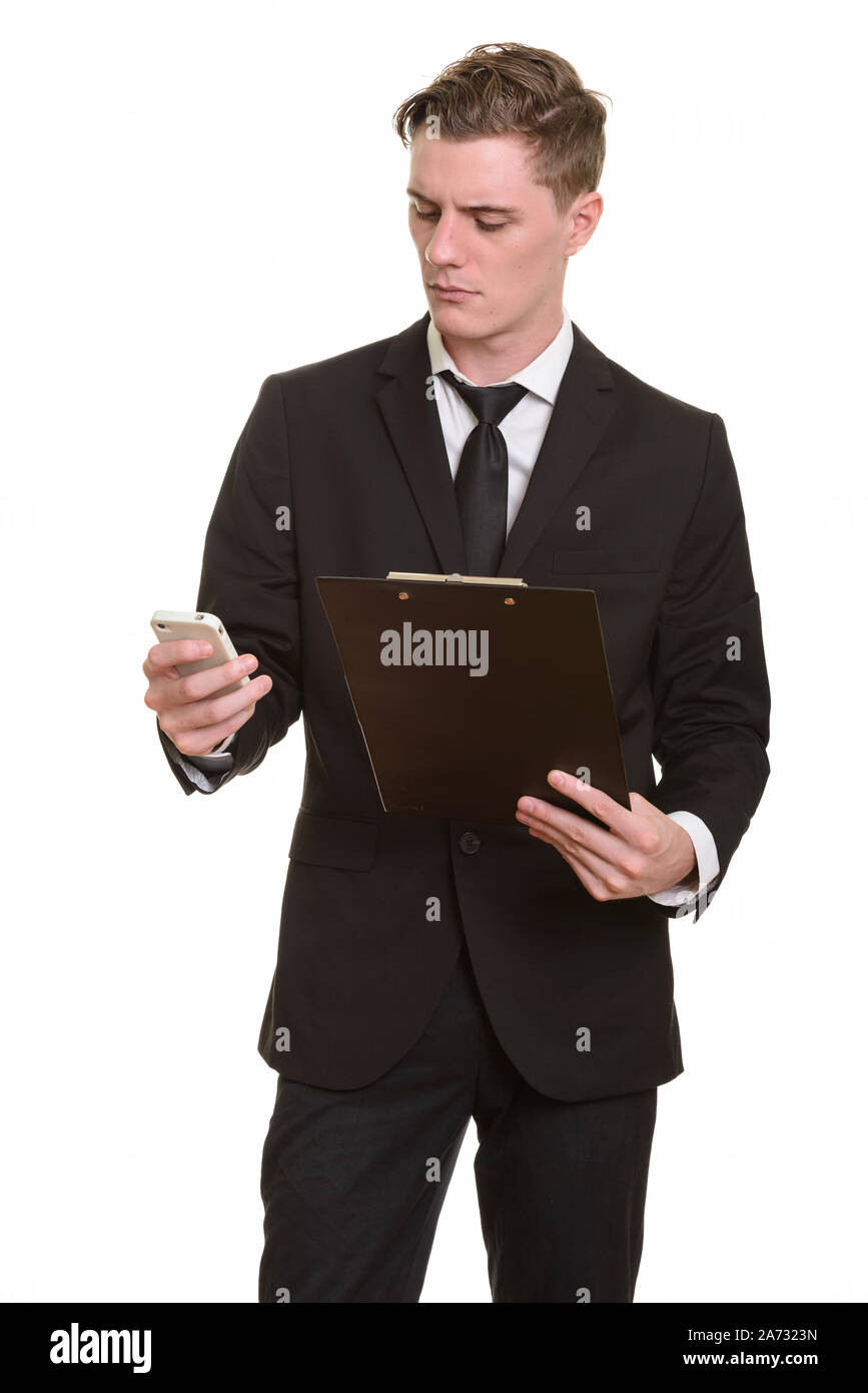 Serious businessman clipboard in hi-res stock photography and images ...