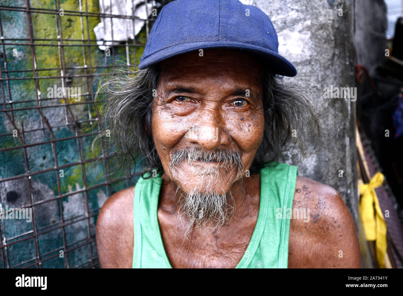 ANTIPOLO CITY, PHILIPPINES – OCTOBER 28, 2019: Adult Filipino man with ...