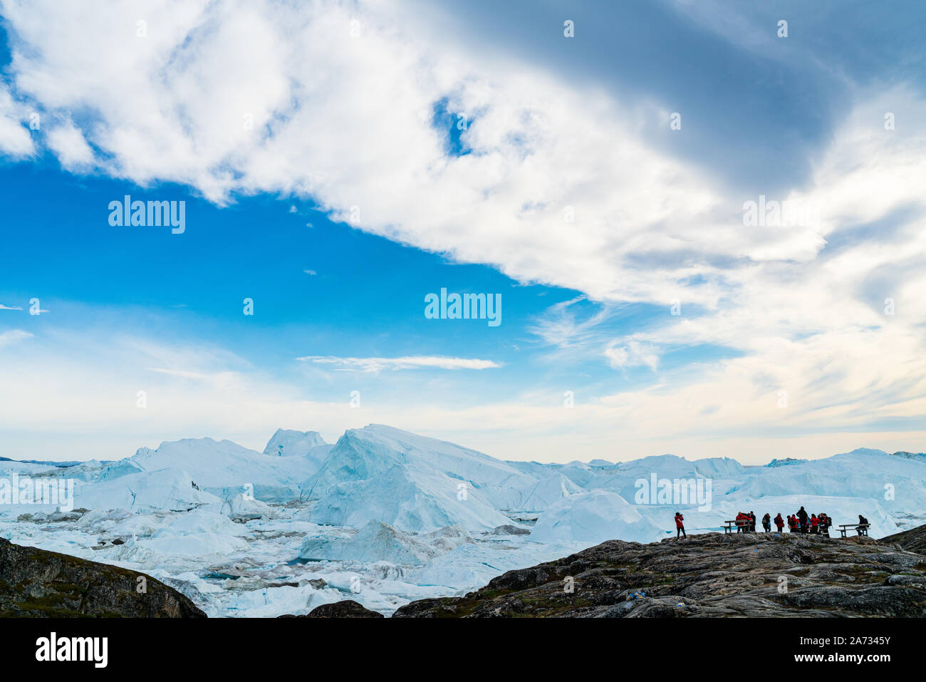 Icebergs in arctic landscape nature with travel tourists in Greenland ...