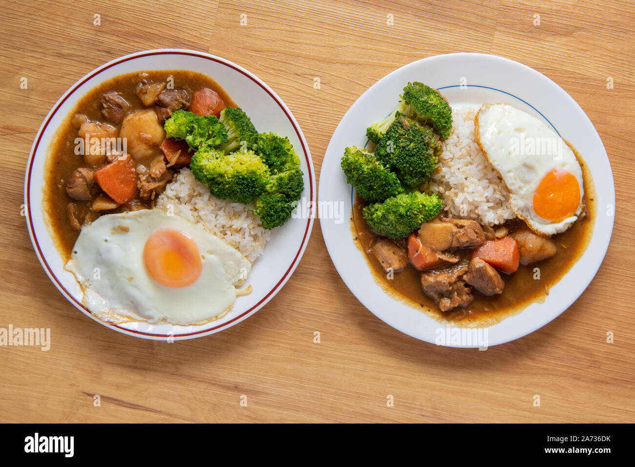 Chicken curry Rice on wooden background ( Poached egg, Potato, enoki ...