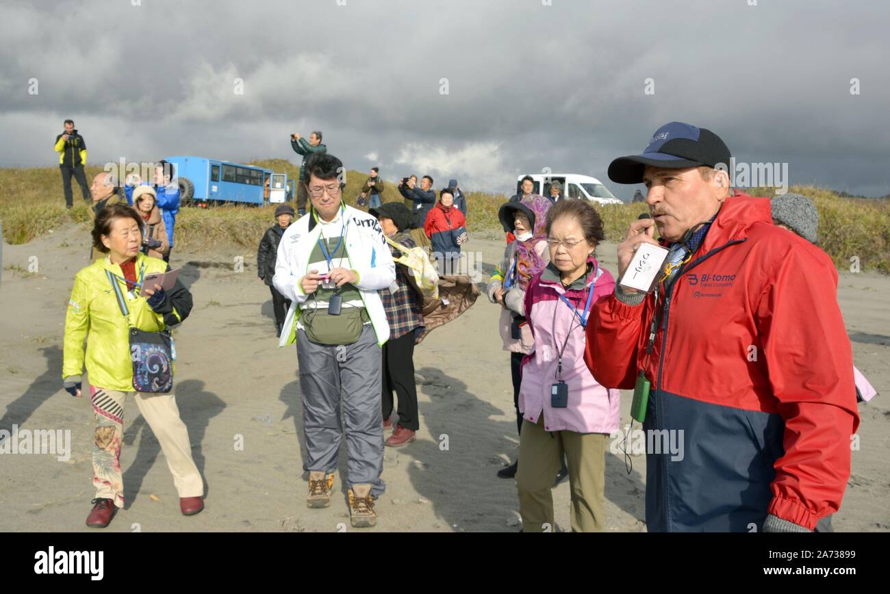 Japanese tourists visit Russian-held Kunashiri Island off Hokkaido ...