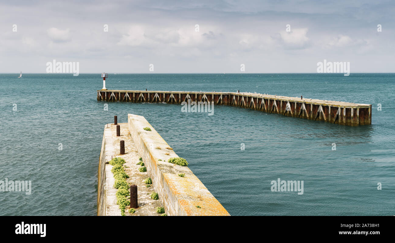Pier in the entrance to the port of Saint Martin de Re in the Island of ...