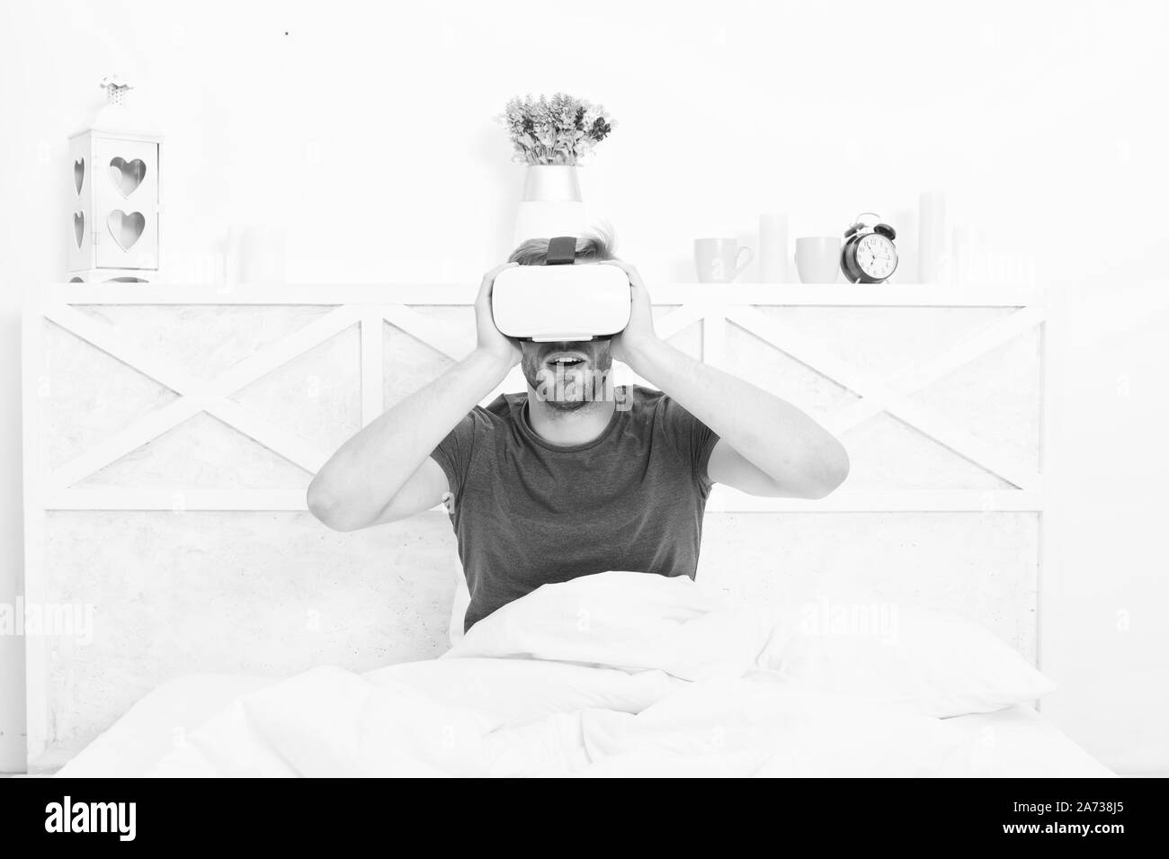 Handsome man wearing vr headset Black and White Stock Photos & Images ...