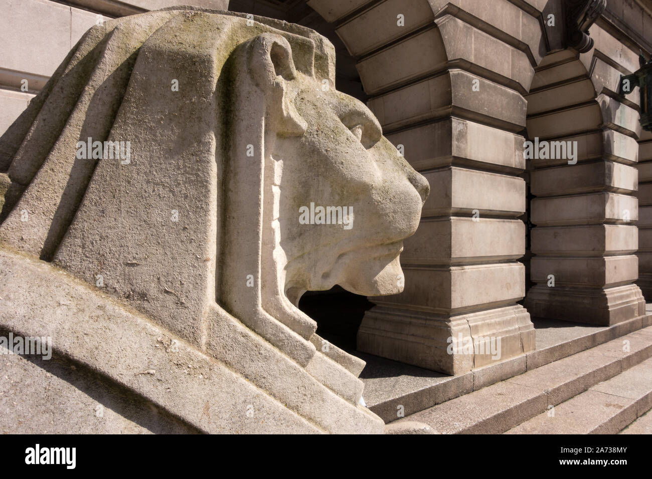 Large stone lion statues in front of rusticated arches of Nottingham ...