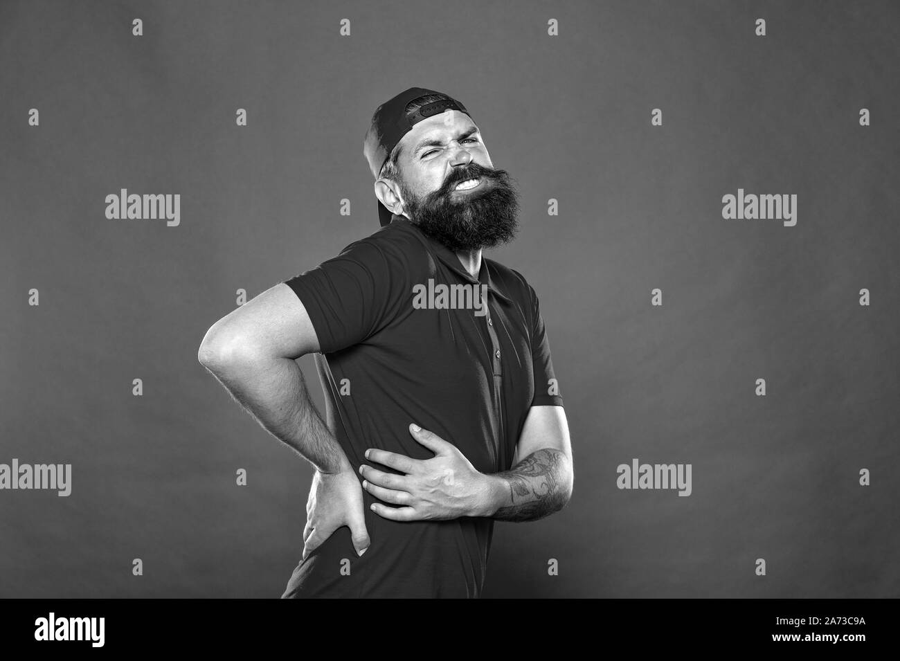 Trauma and treatment. Exercises for back. My back hurts. Man painful ...