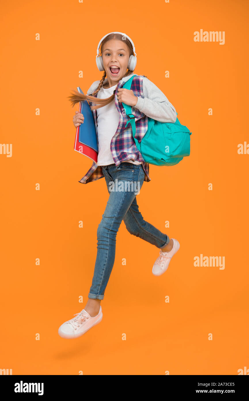 Flying like arrow to lesson. Energetic child hurry to music lesson ...