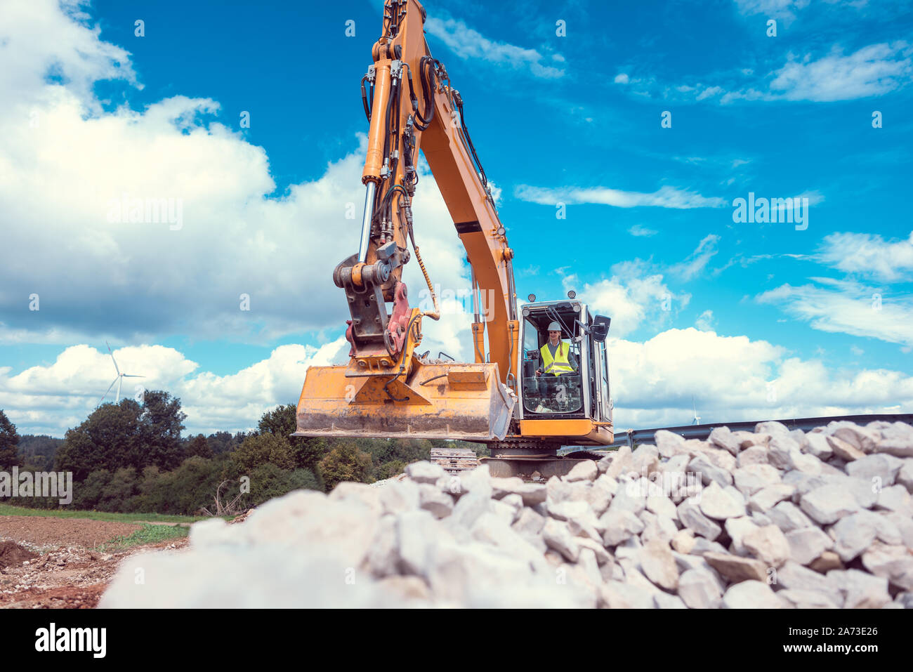 Woman operating excavator on hi-res stock photography and images - Alamy