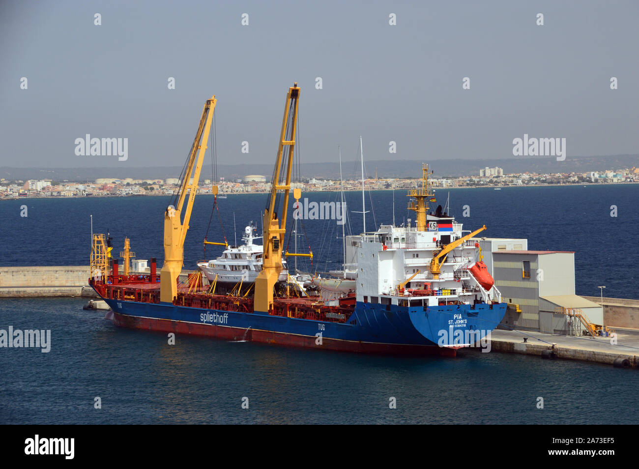 Spliethoff 'PIA' Cargo Ship Carrying a Luxury Yacht on Board tied up in ...
