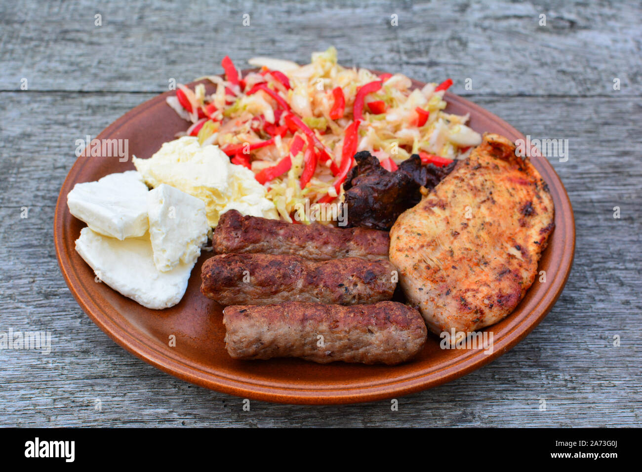 Healthy, tasty and strong dish, chicken steak and liver, cevapcici ...
