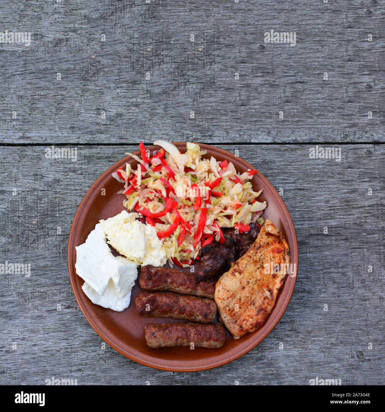 Healthy, tasty and strong dish, chicken steak and liver, cevapcici ...