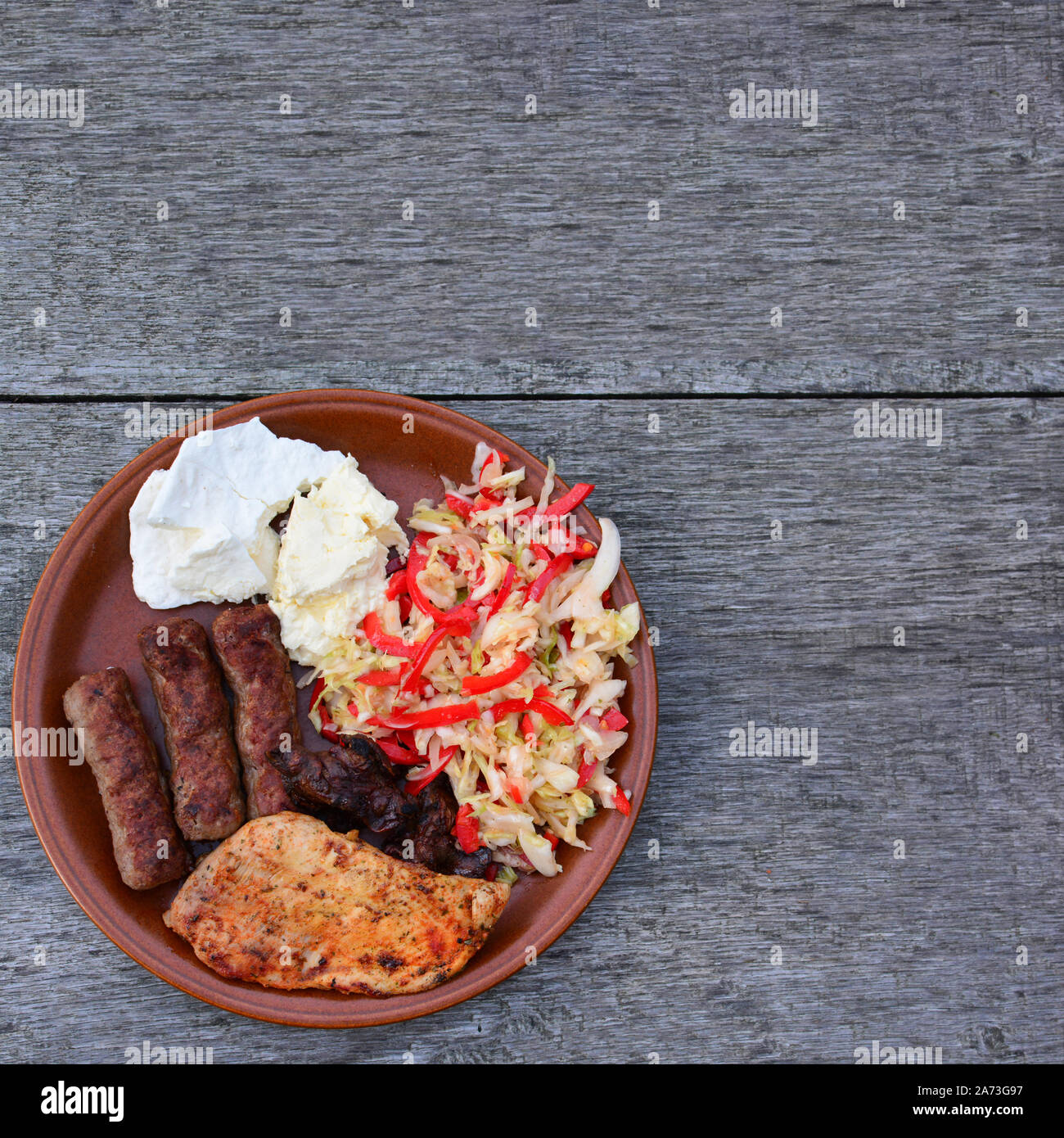 Healthy, tasty and strong dish, chicken steak and liver, cevapcici ...