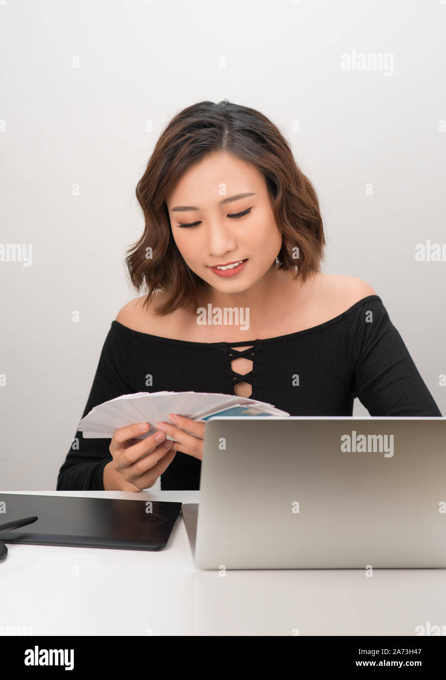 Graphic designer at work. Color swatch samples Stock Photo - Alamy