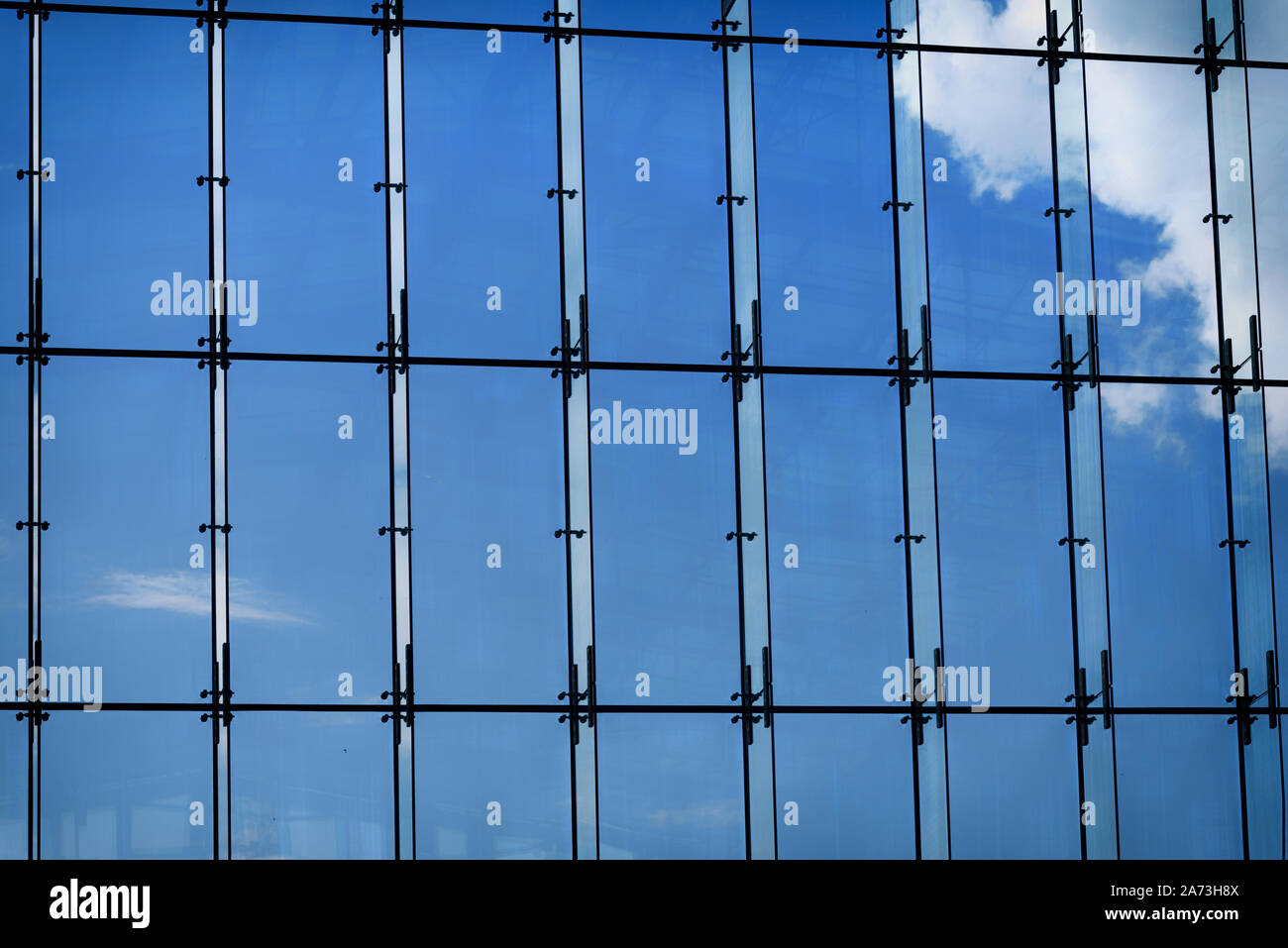 Glass wall form metal framework in a modern corporate business building ...