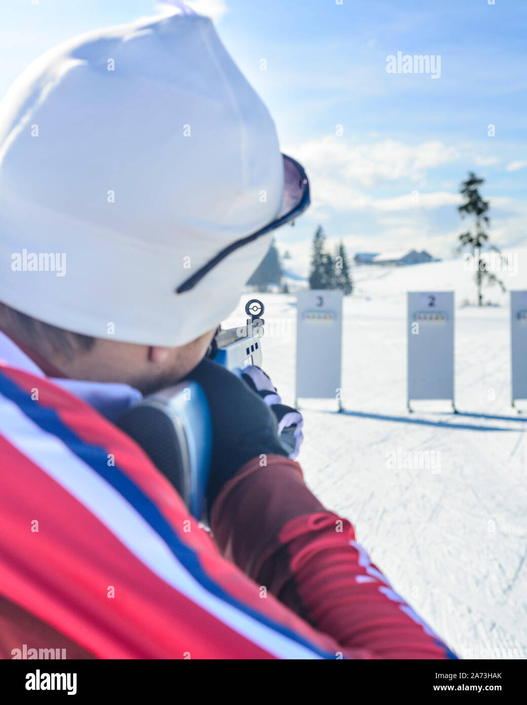 A group of sporty young people doing a biathlon competition Stock Photo ...