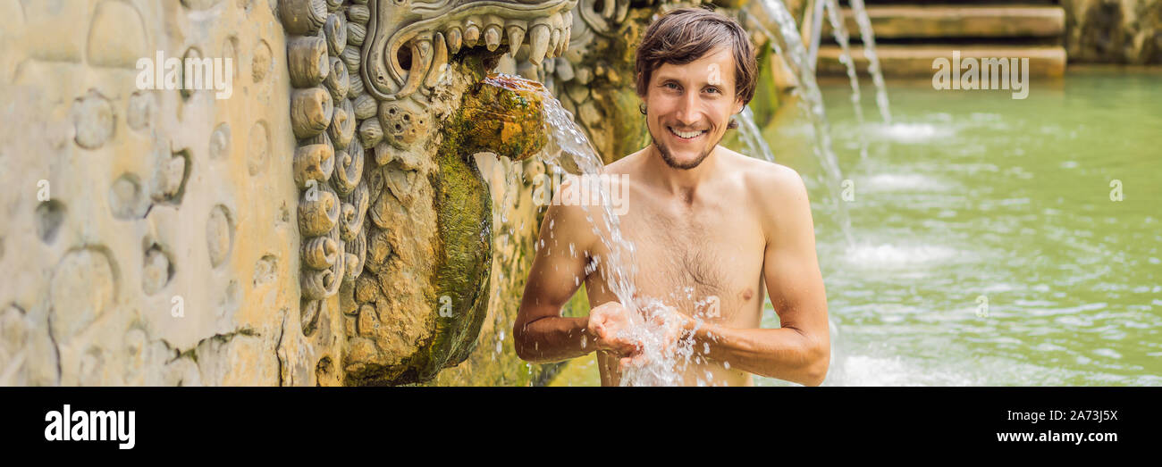 Young man in hot springs banjar. Thermal water is released from the ...