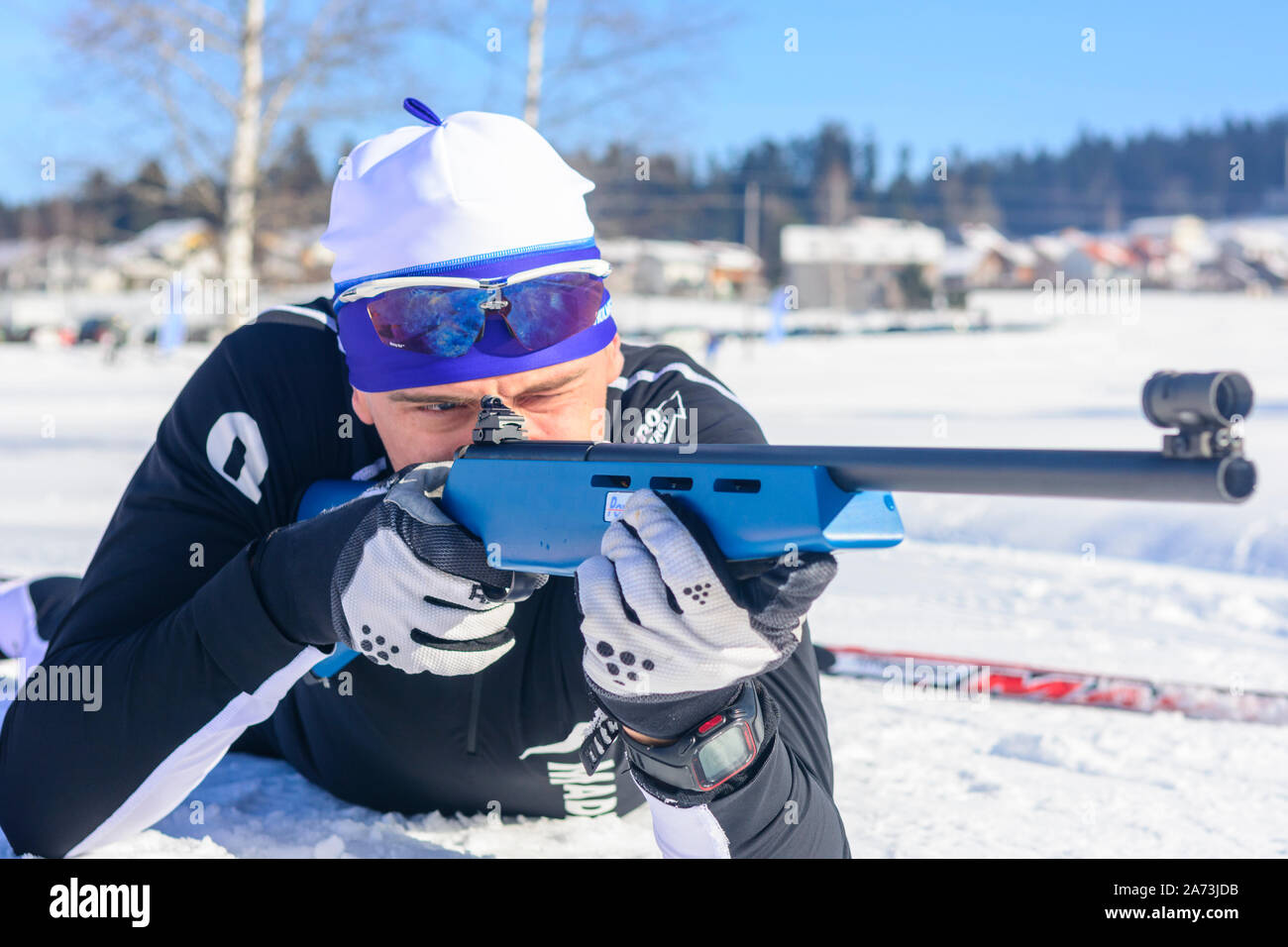 A group of sporty young people doing a biathlon competition Stock Photo ...