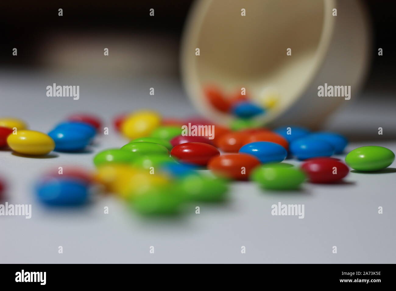 Sugar Coated Chocolate Gems Candy Stock Photo - Alamy