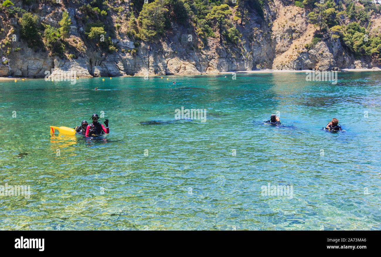 Scuba diver showing OK sign by hand after successful diving in ...
