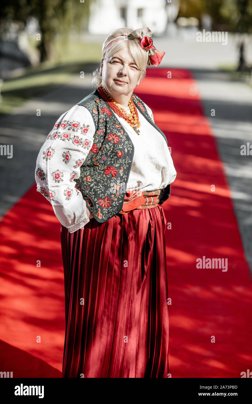 Portrait of a woman dressed in Ukrainian national dress as a well-known ...