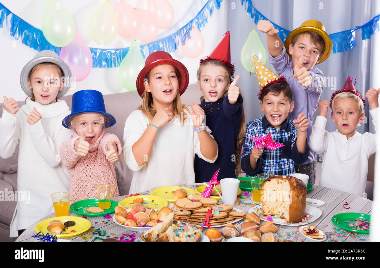 Cheerful children having party to celebrate friend’s birthday Stock ...