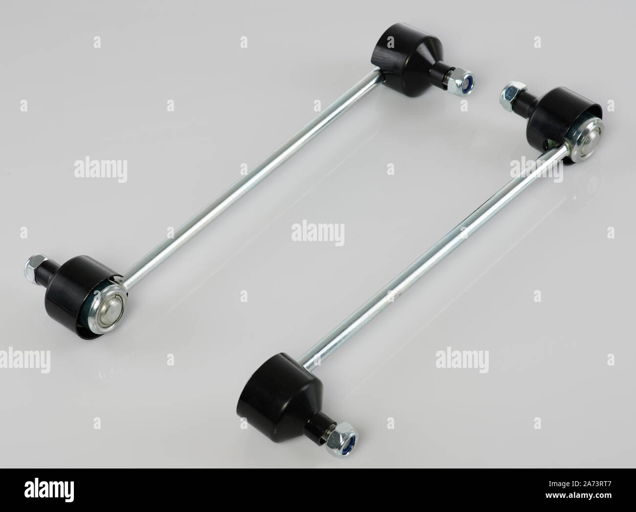 Pair of car tie rods isolated on white background Stock Photo - Alamy
