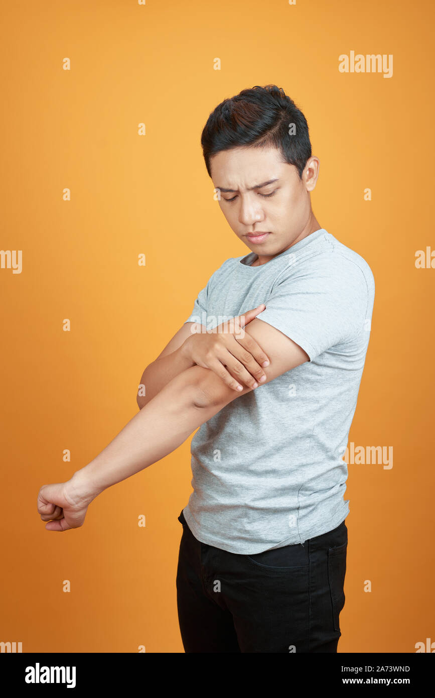 Muscle stiffness arm hi-res stock photography and images - Alamy